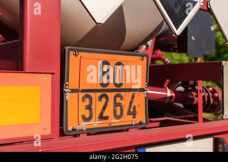 un hazard sign with the danger number 30 and hazardous substance number ...