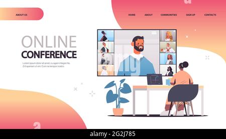 businesswoman discussing with businesspeople during virtual conference ...