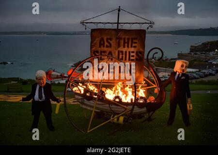 Cornwall, UK. June 11 2021: A worker disinfects a desk at the ...
