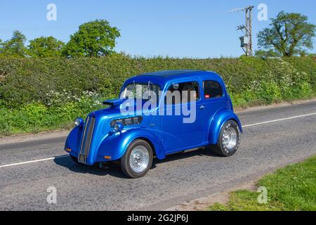 Blue Ford Anglia restored classic British motorcar Stock Photo - Alamy