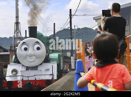 A steam locomotive, modeled on Thomas the Tank Engine and operated by ...