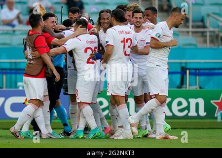 Switzerland's Breel Embolo, (7), celebrates his goal with his teammates ...