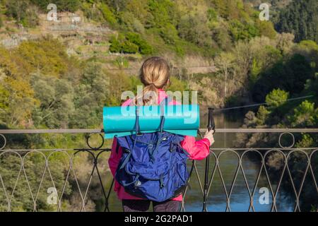 woman with backpack doing rural tourism on excursion Stock Photo - Alamy