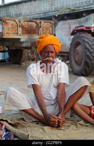 People practice Yoga ahead of International Day of Yoga at Marina Beach ...