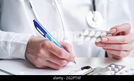 Medical record and pills close up Stock Photo - Alamy