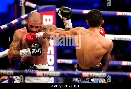 Liam Ritson (left) in action against Jeremias Ponce during the IBF Super-Lightweight World Title ...