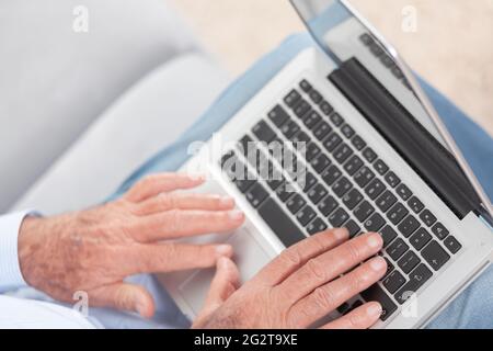 Hand typing on laptop with online accounting system concept Stock Photo ...