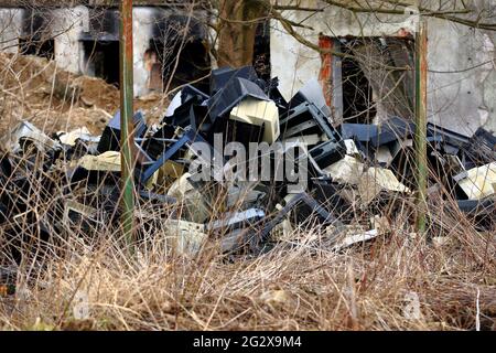 Old computers and monitors abandoned in the suburbs Stock Photo - Alamy