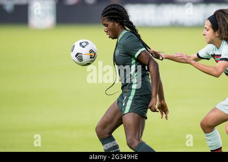 June 13, 2021: Nigeria forward Michelle Alozie (22) heads the ball over ...
