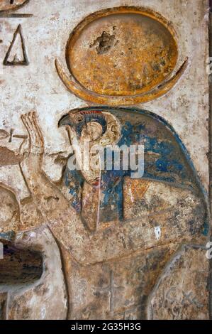 Wall relief of the falcon-headed god Horus and his wife Hathor at the ...