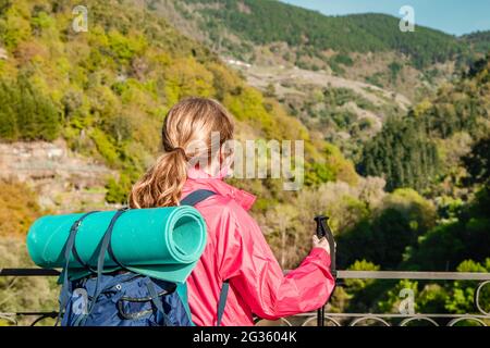 woman with backpack doing rural tourism on excursion Stock Photo - Alamy
