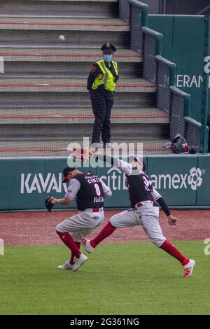 Julian Ornelas #31 of Diablos Rojos slides to the home during the game ...