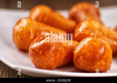 Neapolitan Baba au rum Stock Photo - Alamy