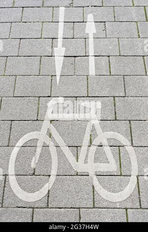 Pictogram cycle lane in both directions, marking on the ground in the ...