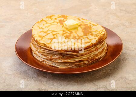Stack of Russian traditonal pancakes with butter Stock Photo - Alamy