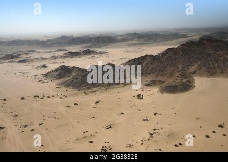 An enchanting aerial view of the vast desert landscape in Madinah ...