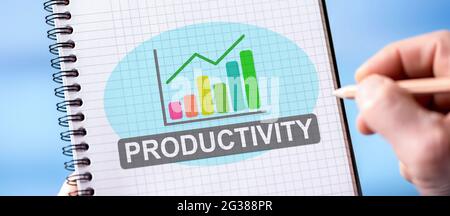 Hand drawing Productivity improvement graph with blue marker on ...