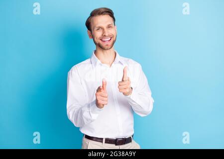 Photo of good mood charismatic businessman show thumb-up feedback hold ...