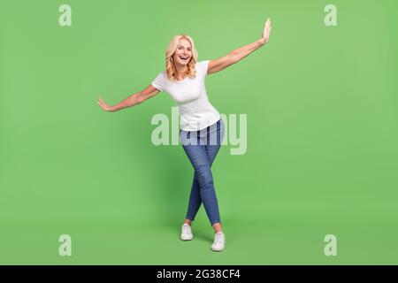Photo of adorable nice cute impressed girl with bob hairdo dressed red ...