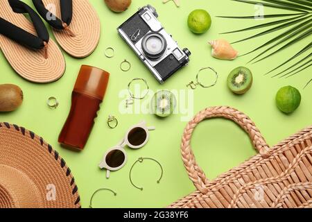 Composition with beach accessories, cosmetics and fruits on color ...