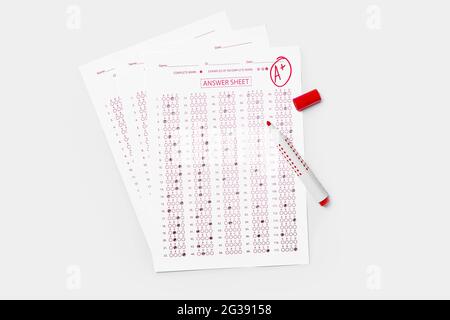 Checked answer sheet and marker on white background, closeup Stock Photo - Alamy