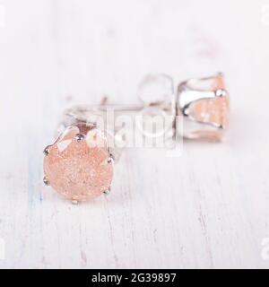 Shiny Silver earrings Round design Hanging for girls and women Stock ...