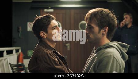 THE MAN WITH THE ANSWERS, from left: Anton Weil, Vasilis Magouliotis ...