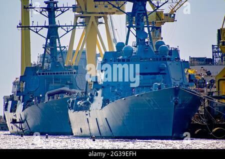 Military warships are under construction at Ingalls Shipbuilding, a ...