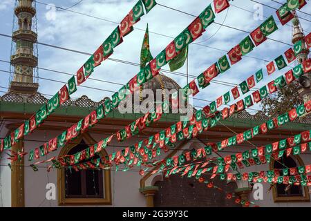 Bunting of Islamic flag hanging outside Sunni Islamic Jamia Masjid ...