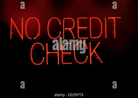 Neon Sign No Credit Check. Real Photo with Bokeh Stock Photo - Alamy