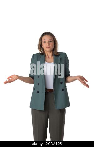 Confused woman gesturing with hands on blue background Stock Photo - Alamy
