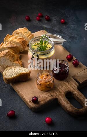 Goose liver pate with cranberries on a dark background Stock Photo - Alamy