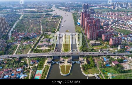 NANTONG, CHINA - JUNE 15, 2021 - Ships pass through Hai 'an Shiplock in ...