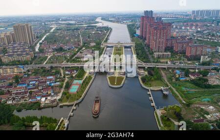 NANTONG, CHINA - JUNE 15, 2021 - Ships pass through Hai 'an Shiplock in ...