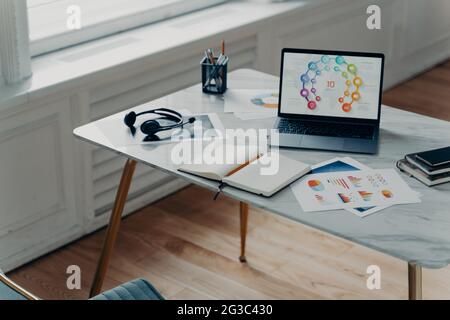 A desktop computer PC with opened cabinet showing the internal parts ...