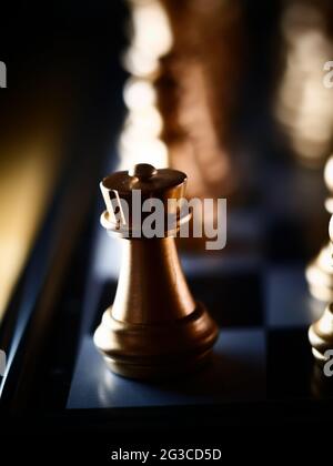 A shiny metallic rook chess piece, symbolizing strategy and competition ...