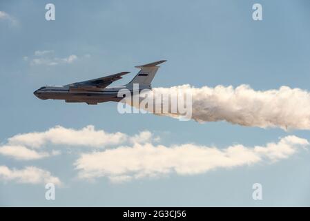 Air plane. Fire plane. Fire extinguishing. Discharge of water from an ...