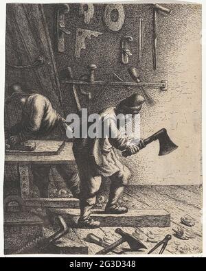 worker at carpenter workspace cutting the wood board using saw t Stock ...