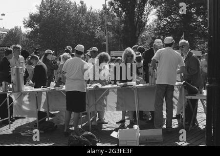 Group of people at tables; Strike Stock Photo - Alamy