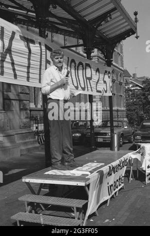 Man gives a speech standing on a table; Strike Stock Photo - Alamy