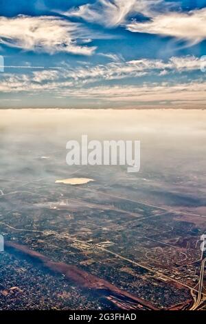 heavenly sky between the white clouds and the radiant sun Stock Photo ...