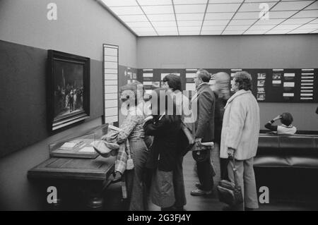 Visitors standing for the night watch; Room with the night watch Stock ...