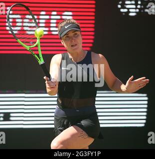 Elina Svitolina of Ukraine plays a forehand return to Madison Keys of ...