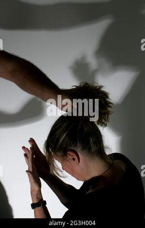 Domestic violence in the home, posed by models Stock Photo - Alamy