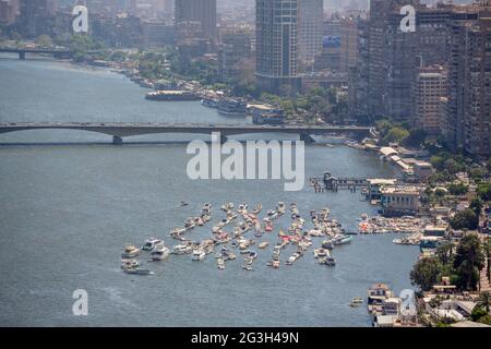 Aerial view of Cairo with the Nile, modern towers, bridges, and dense ...