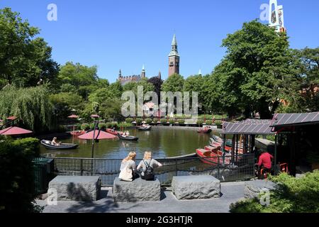 Copenhagen, Denmark. 16 UNE 2021,Peope enjoy summer day in Tivoli ...