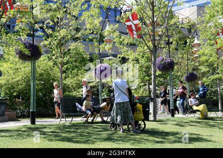 Copenhagen, Denmark. 16 UNE 2021,Peope enjoy summer day in Tivoli ...