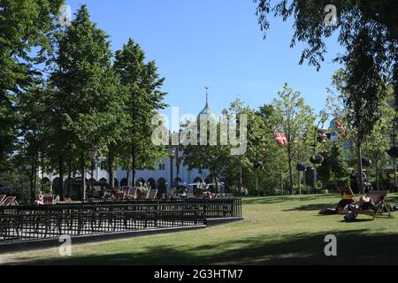 Copenhagen, Denmark. 16 UNE 2021,Peope enjoy summer day in Tivoli ...