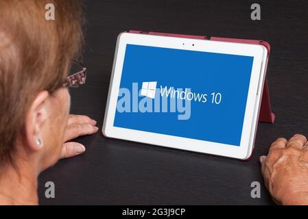 HEERENVEEN, NETHERLANDS, June 6, 2015: Tablet computer with Windows 10 ...