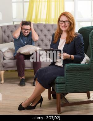 Handsome man at the psychotherapist Stock Photo - Alamy